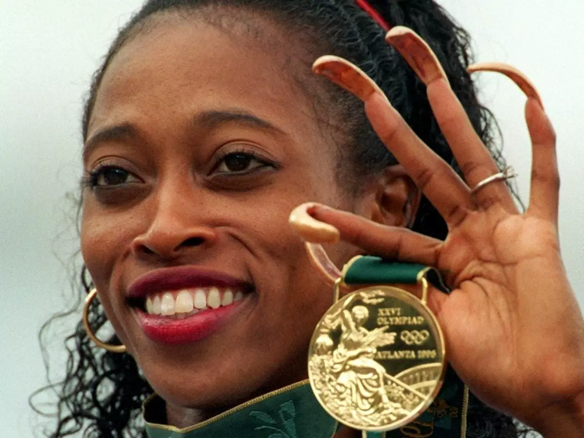 Gail Devers 'Siginecha Zvipikiri Aive Stylish - uye Chiratidzo chaaive aine Kudzora kwechirwere cheMakuva ake.