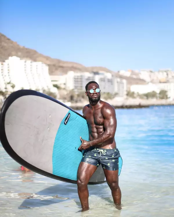 10 Φωτογραφίες Μαύρων Ανδρών που ταξιδεύουν για να κάνετε τις διακοπές σας φωτεινές 31181_6